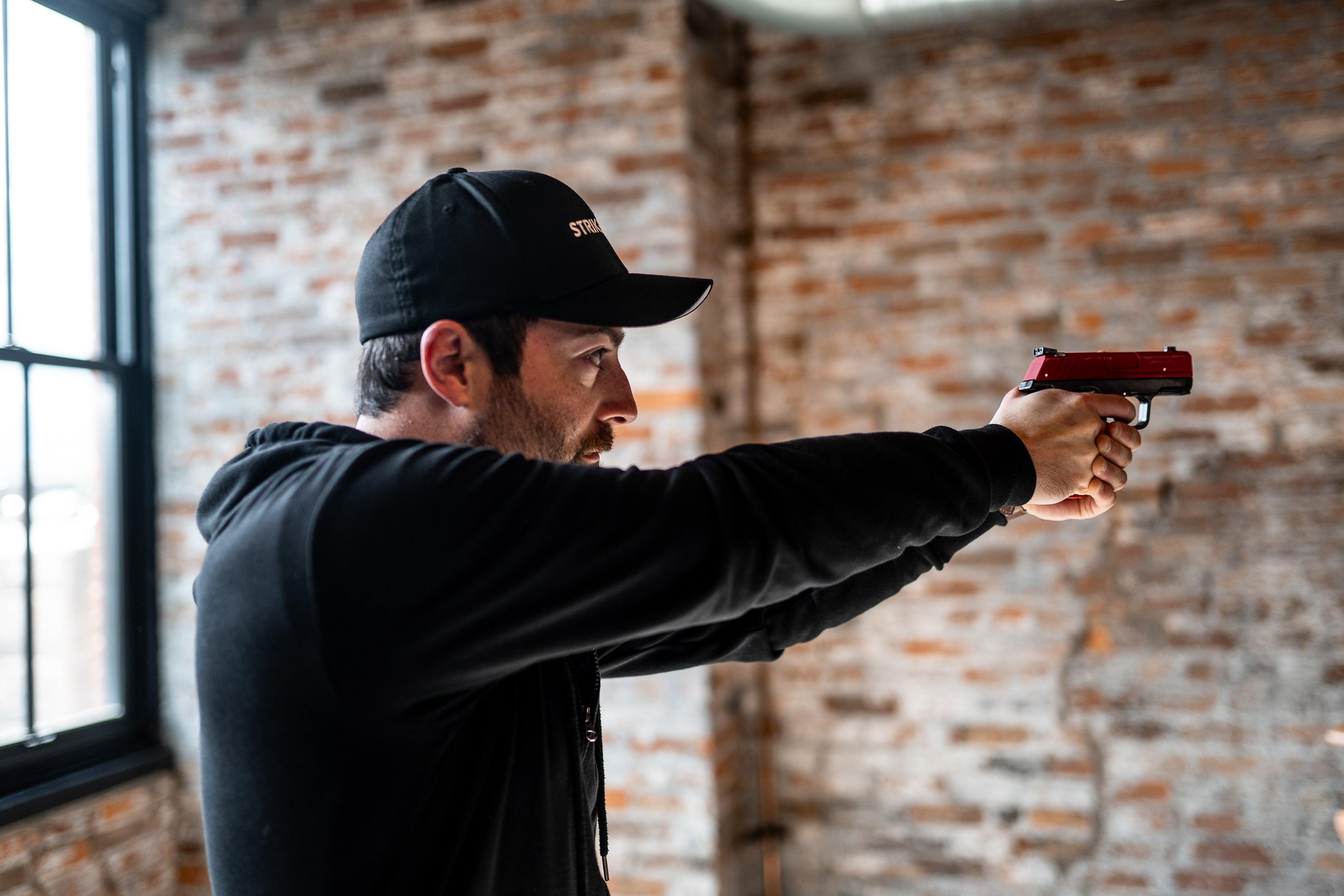 About | Strikeman Dry-Fire Training Systems